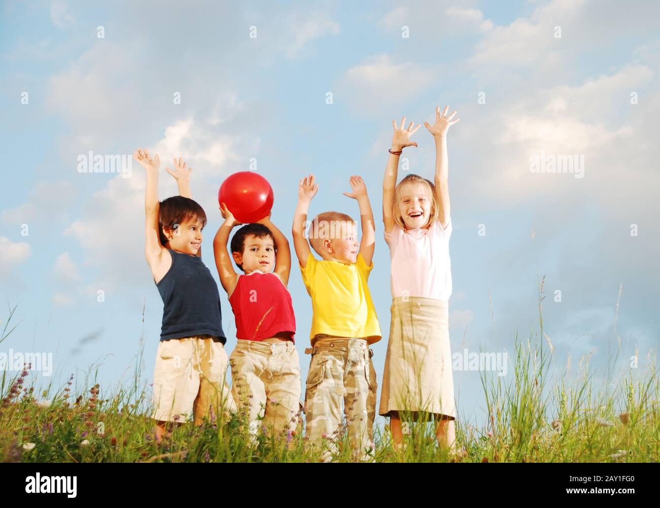 happy children raising hands upwards Stock Photo - Alamy