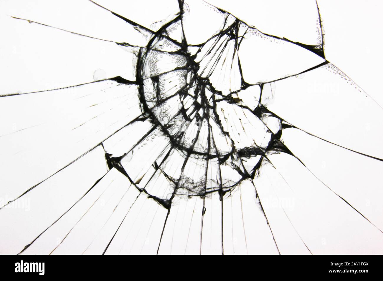 Broken glass with cracks in the window Stock Photo - Alamy