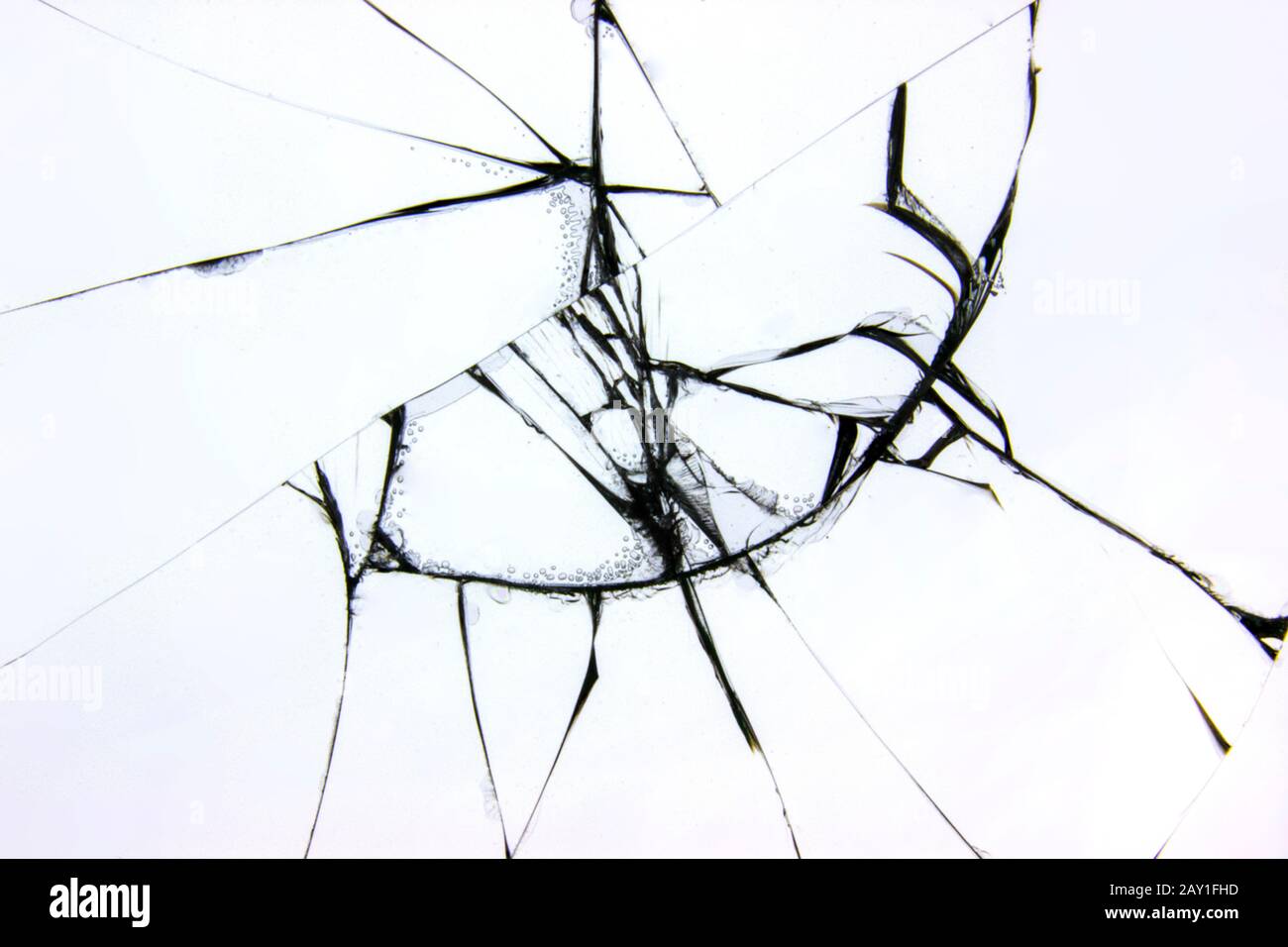 Broken glass with cracks in the window Stock Photo - Alamy