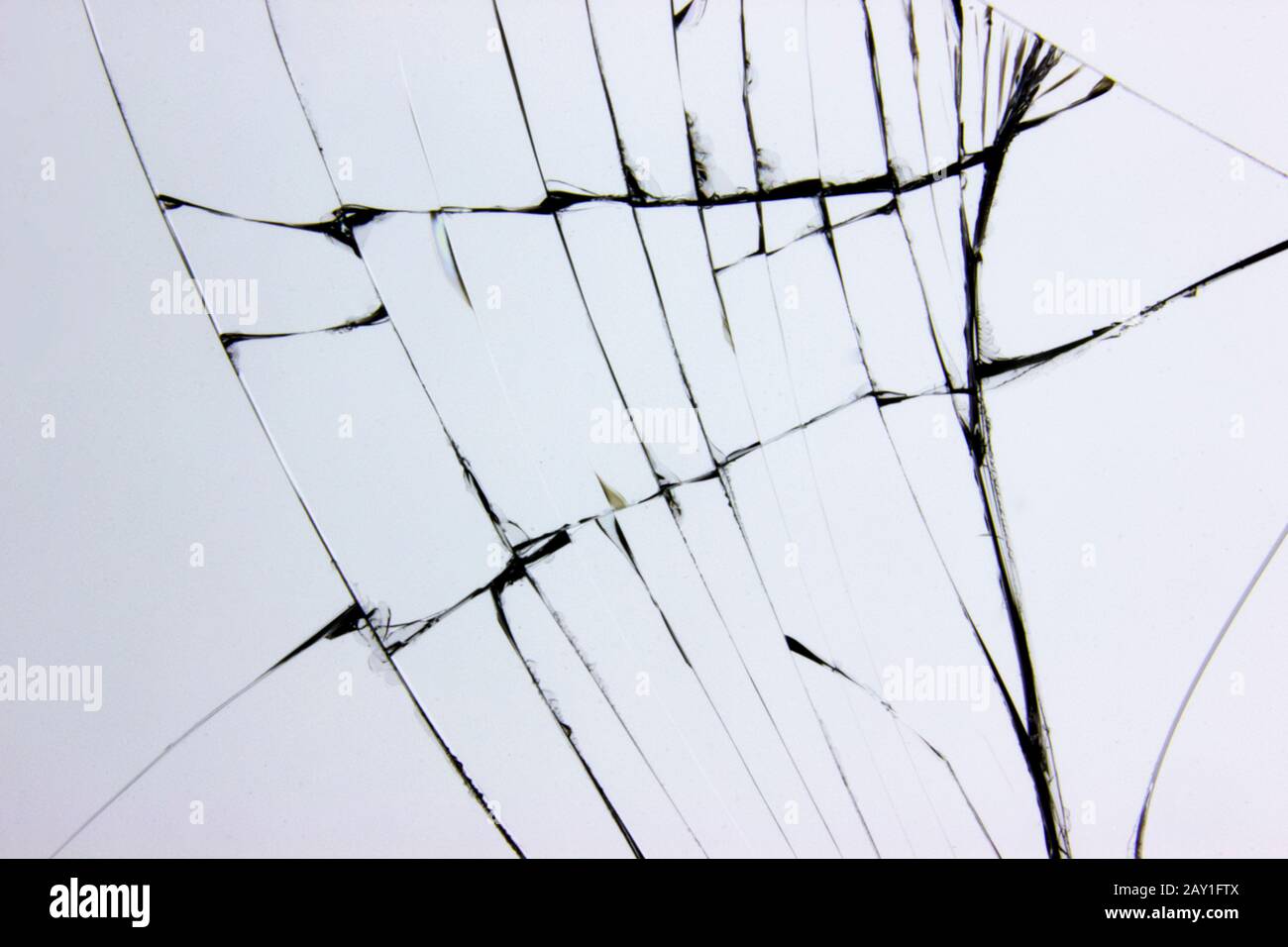 Broken glass with cracks in the window Stock Photo - Alamy