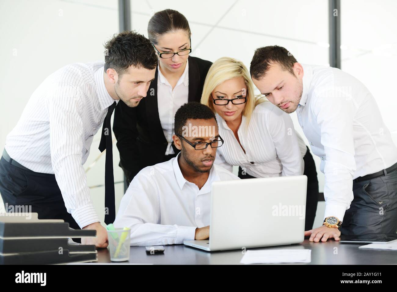 Successful business people having discussion at office Stock Photo - Alamy
