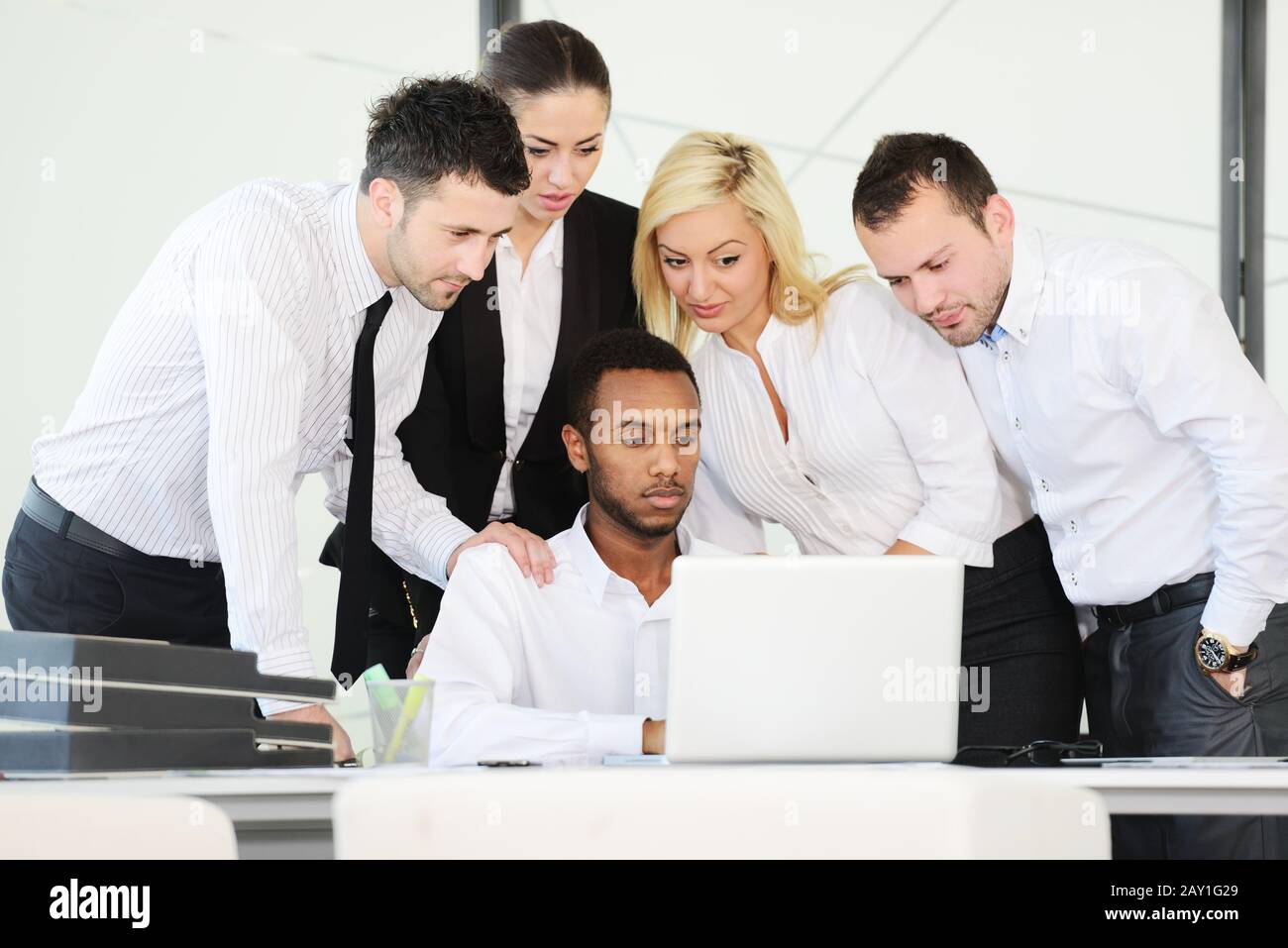 Successful business people having discussion at office Stock Photo - Alamy