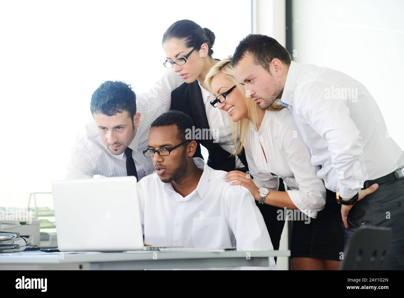 Successful business people having discussion at office Stock Photo - Alamy