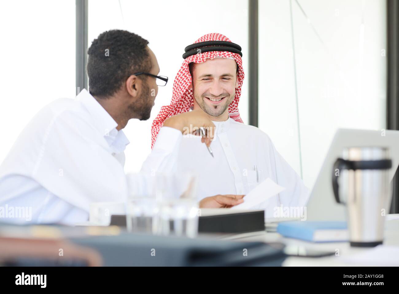 Group of multi ethnic business people at work Stock Photo - Alamy