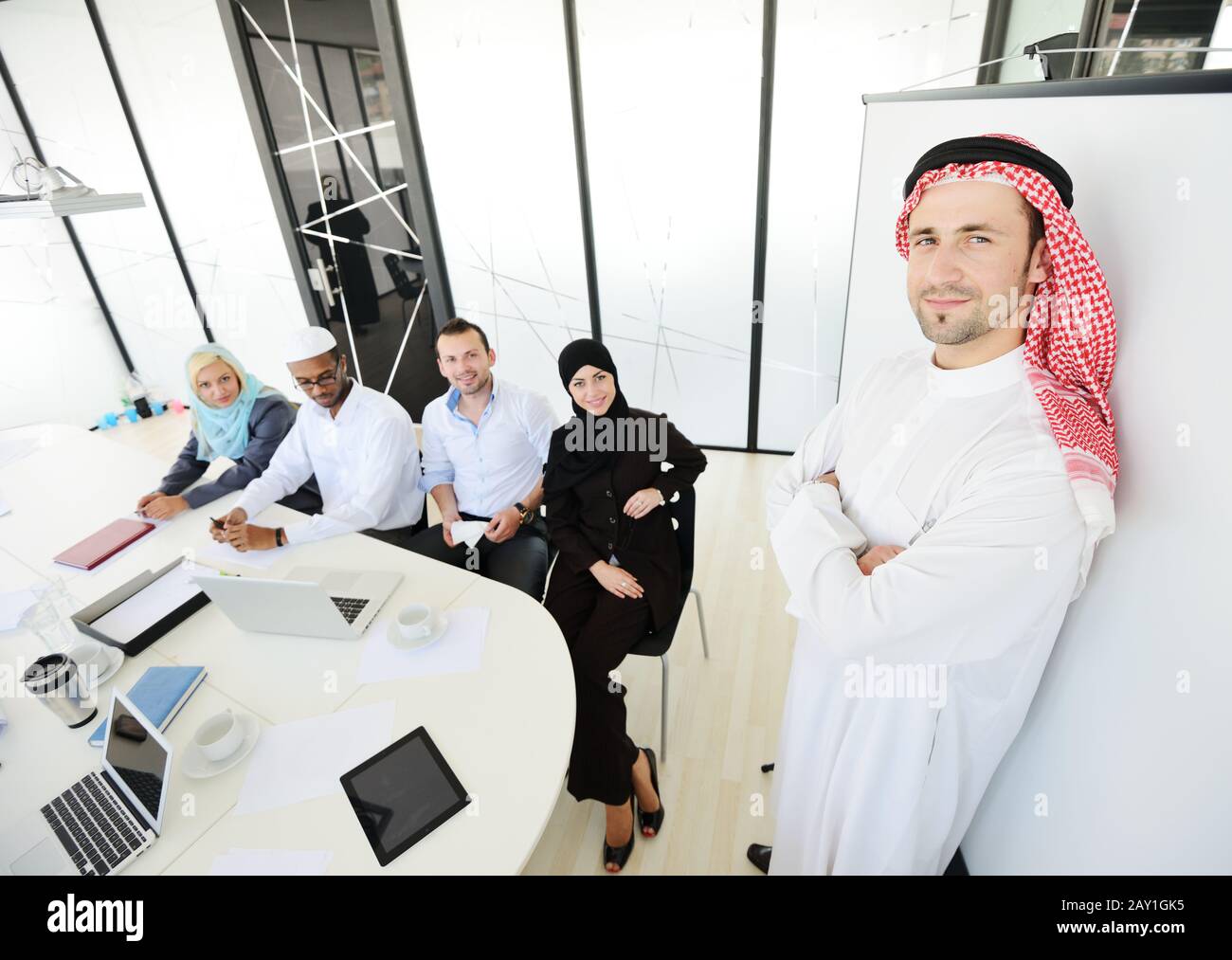 Group of multi ethnic business people at work Stock Photo - Alamy