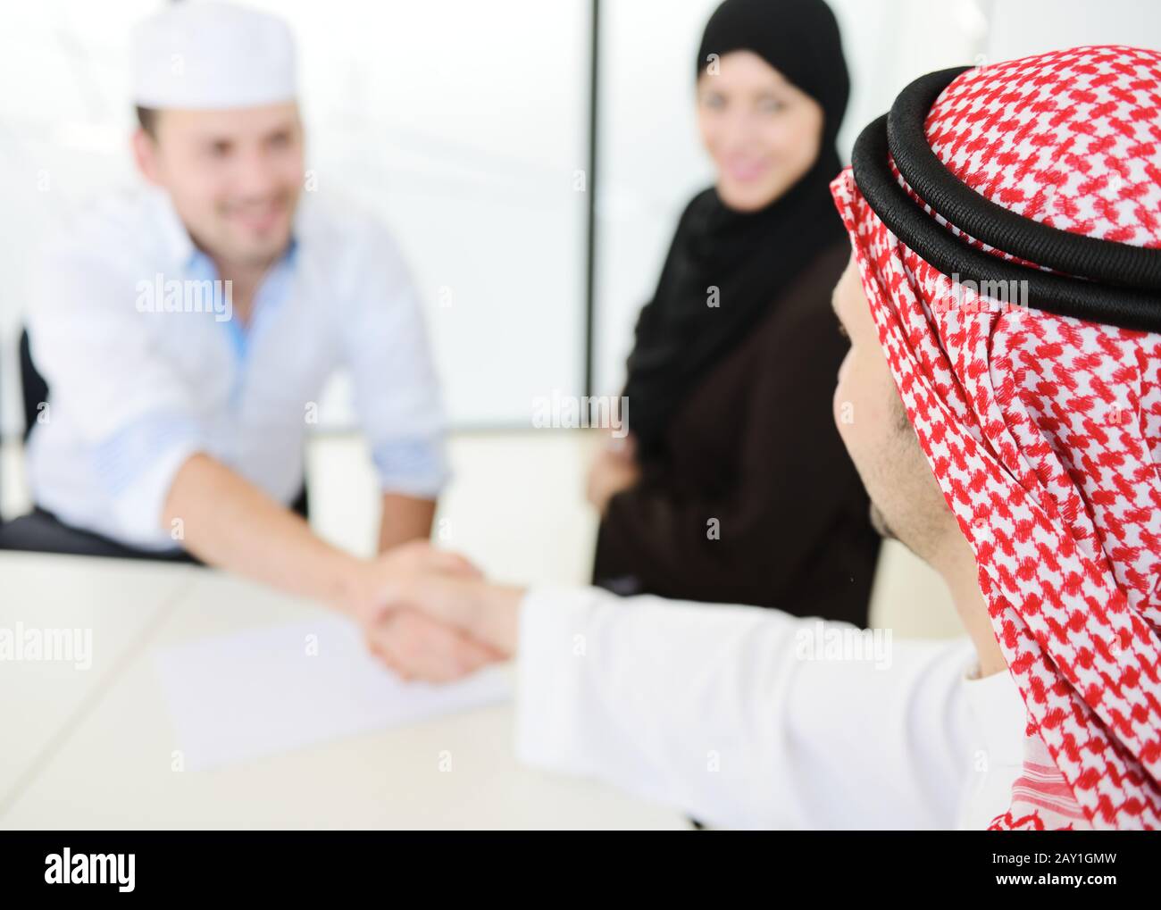 Group of multi ethnic business people at work Stock Photo - Alamy