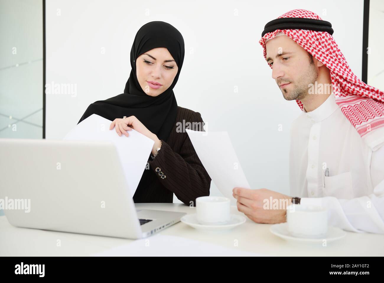 Middle eastern business people in modern office Stock Photo - Alamy
