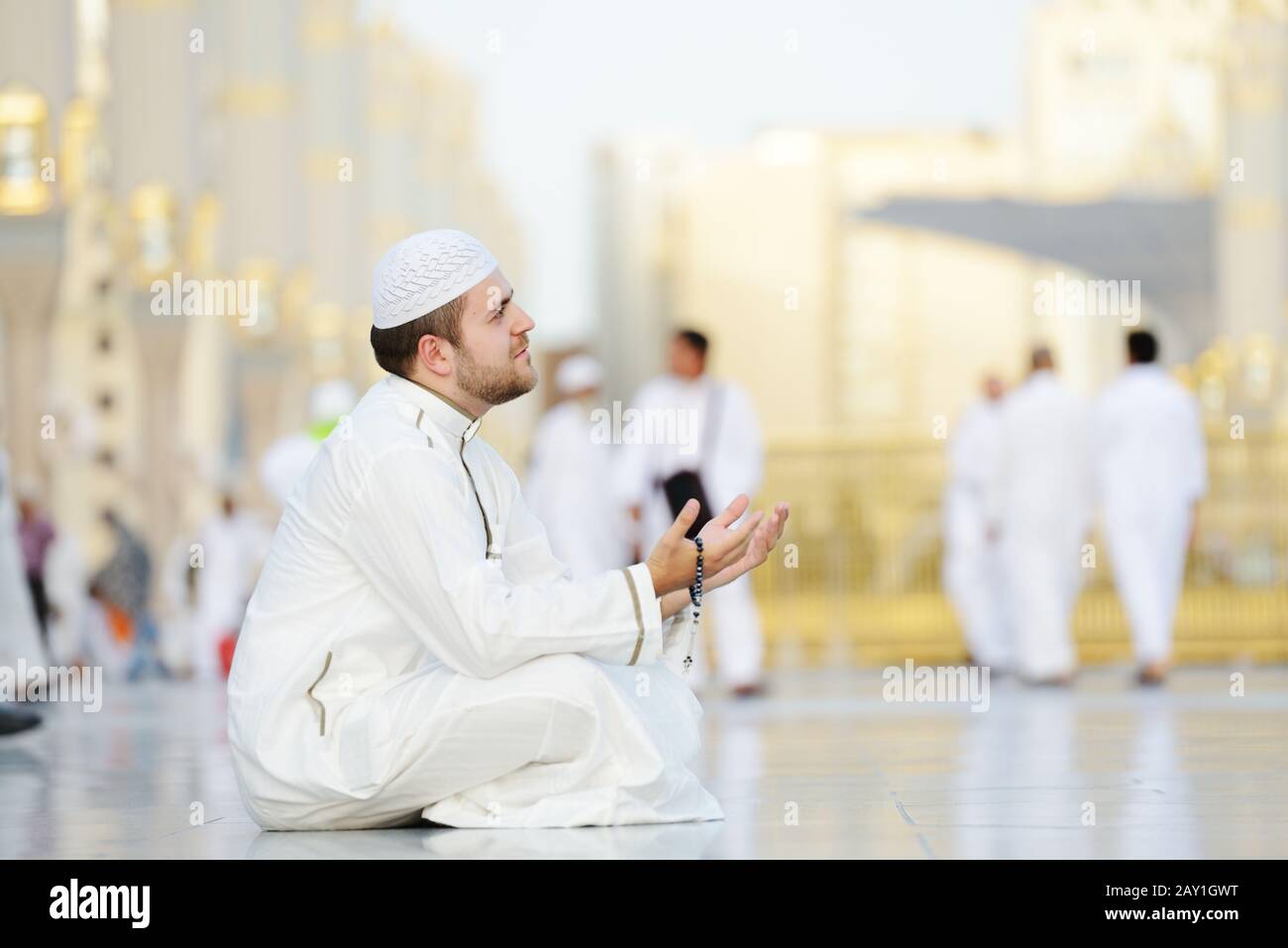 Muslim prayer at holy mosque Stock Photo - Alamy