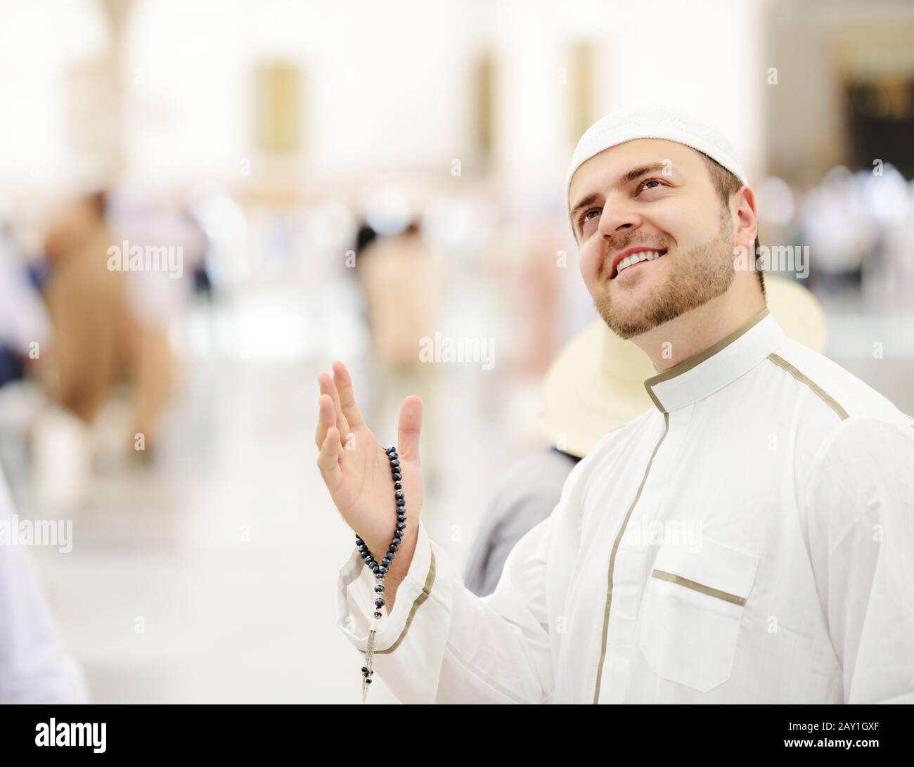 Muslim praying at Medina mosque Stock Photo - Alamy