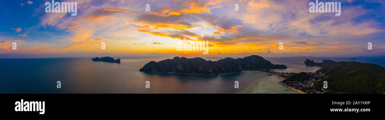 Amazing sunset aerial view of Nui Beach from drone. Ko Phi Phi Don ...