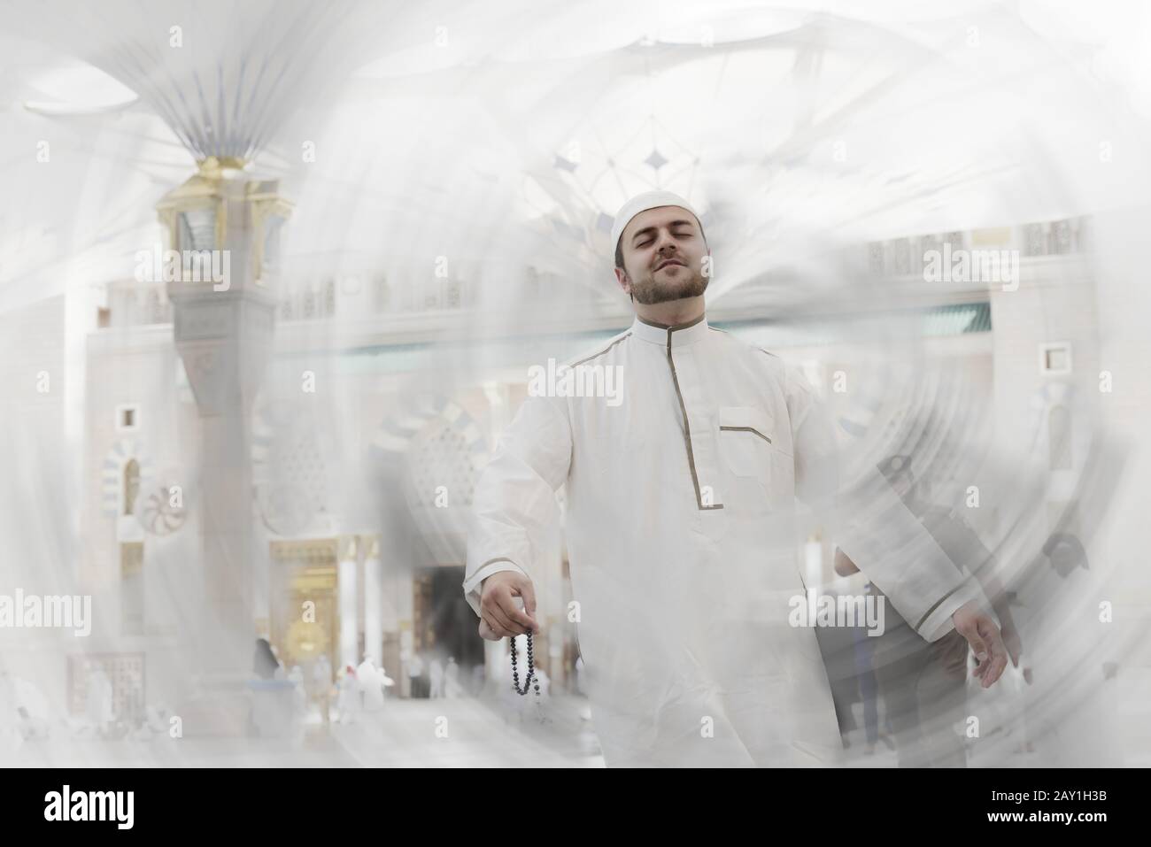 Muslim praying at Medina mosque Stock Photo - Alamy