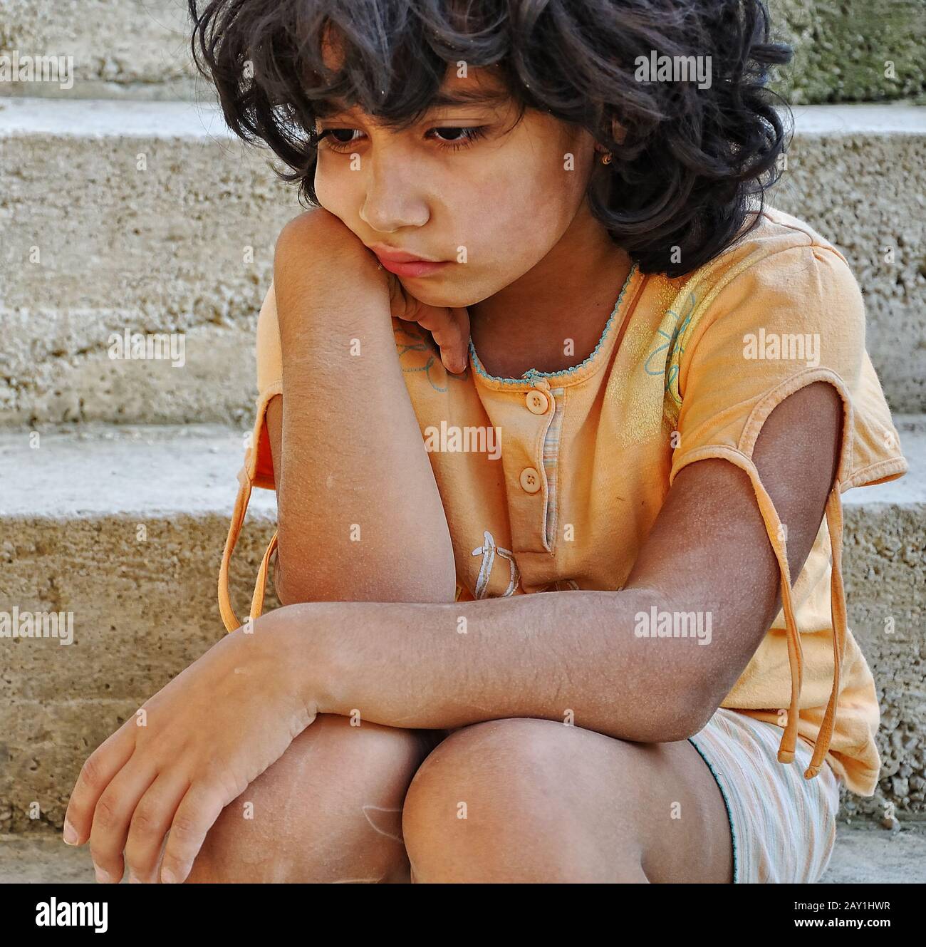 Poverty and poorness on the expression of children Stock Photo - Alamy