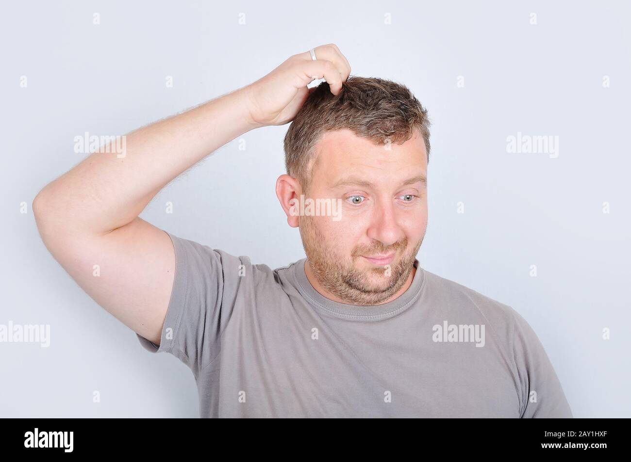 Confused face hi-res stock photography and images - Alamy