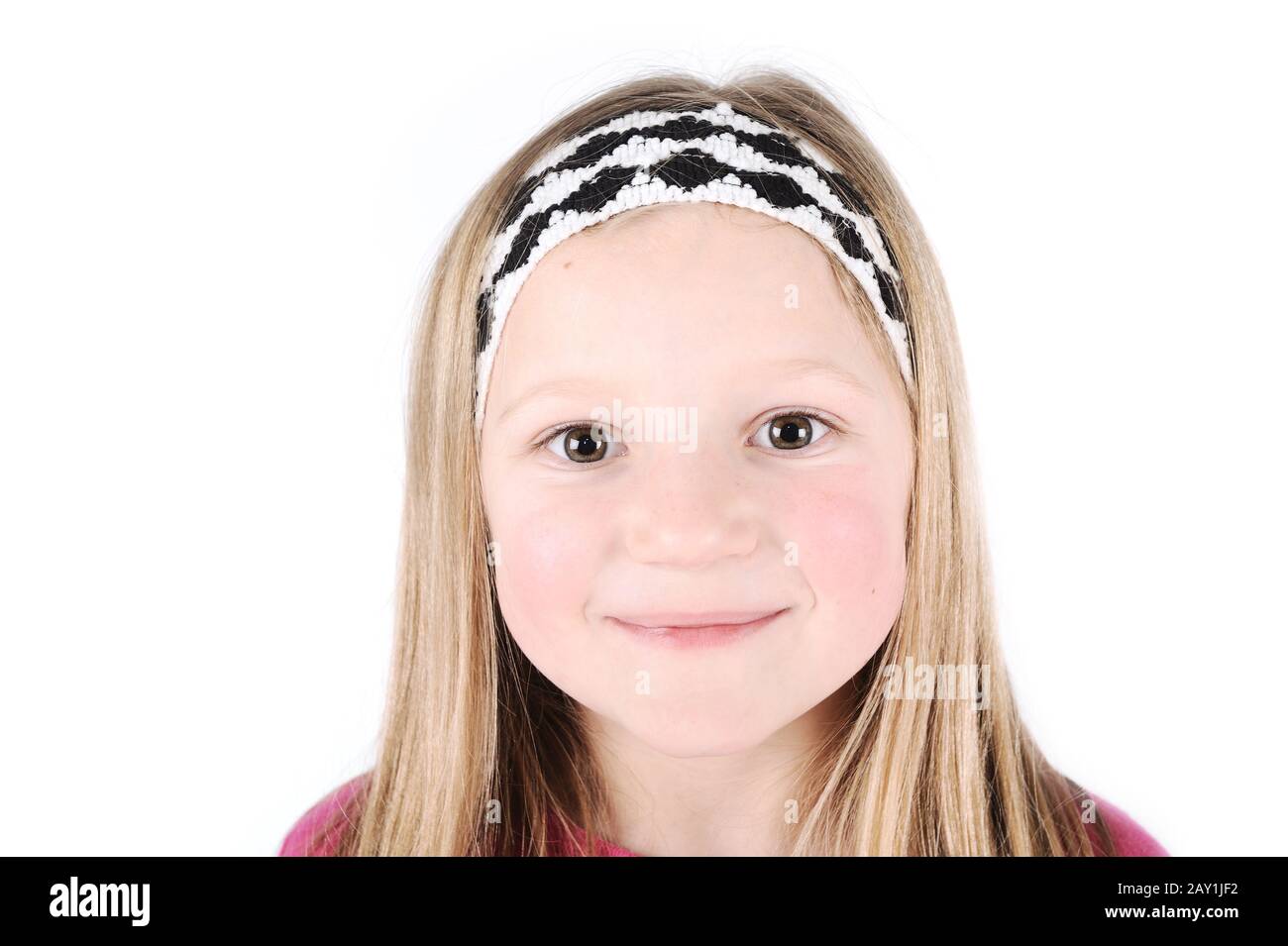 Smart blonde little girl smiling Stock Photo - Alamy