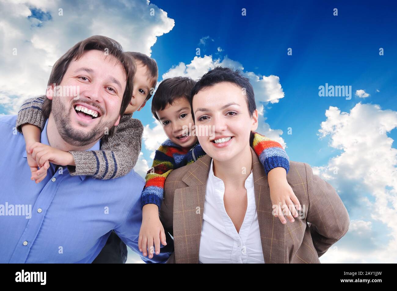 Very beautiful happy family Stock Photo - Alamy