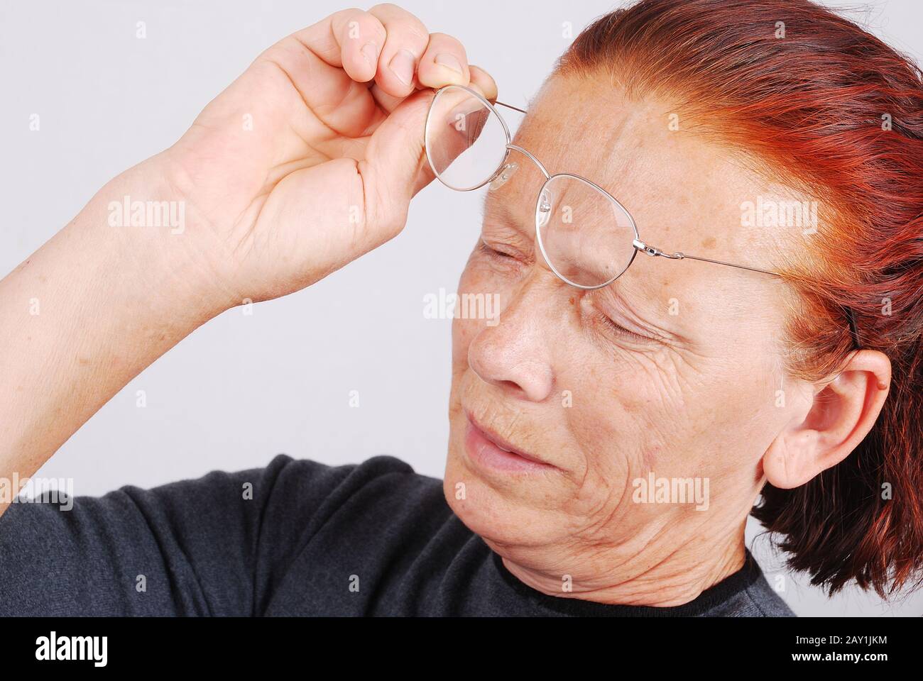 Elderly woman has a problem with sight Stock Photo - Alamy