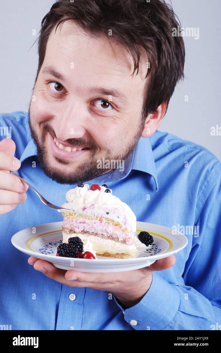 Man Eating Chocolate Cake High Resolution Stock Photography and Images ...
