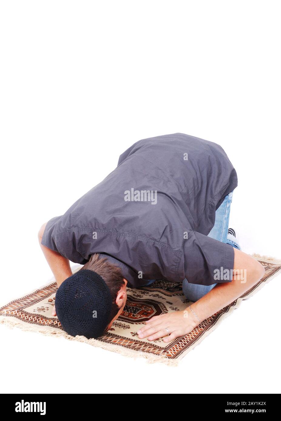 Muslim man is praying on traditional way Stock Photo - Alamy