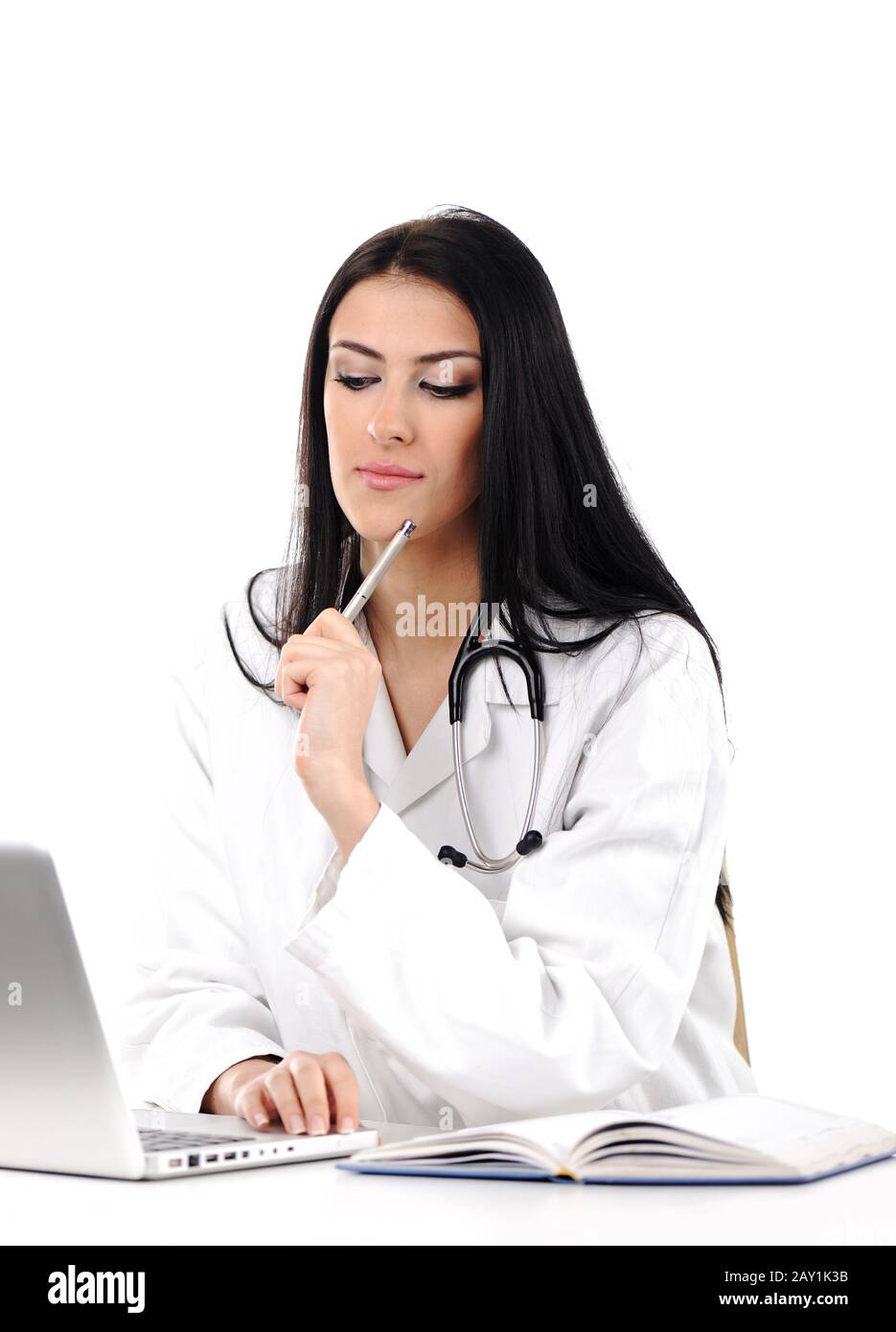 Thinking woman laptop in Cut Out Stock Images & Pictures - Alamy