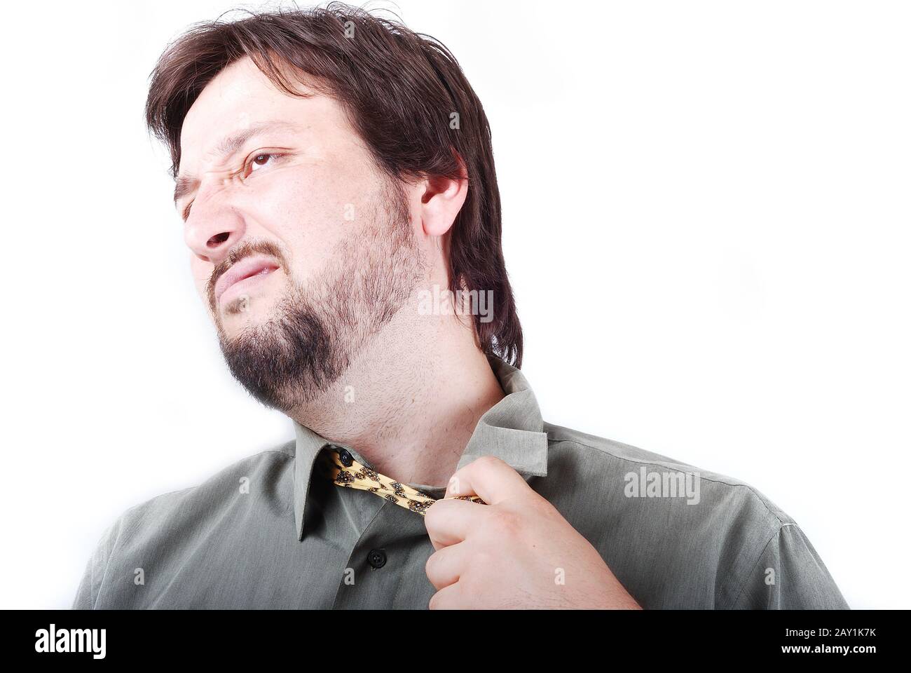 Man wearing shirt and tie with bored face Stock Photo - Alamy
