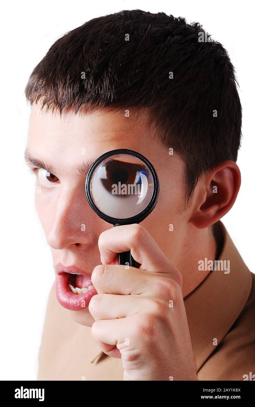 Searching young man Stock Photo - Alamy