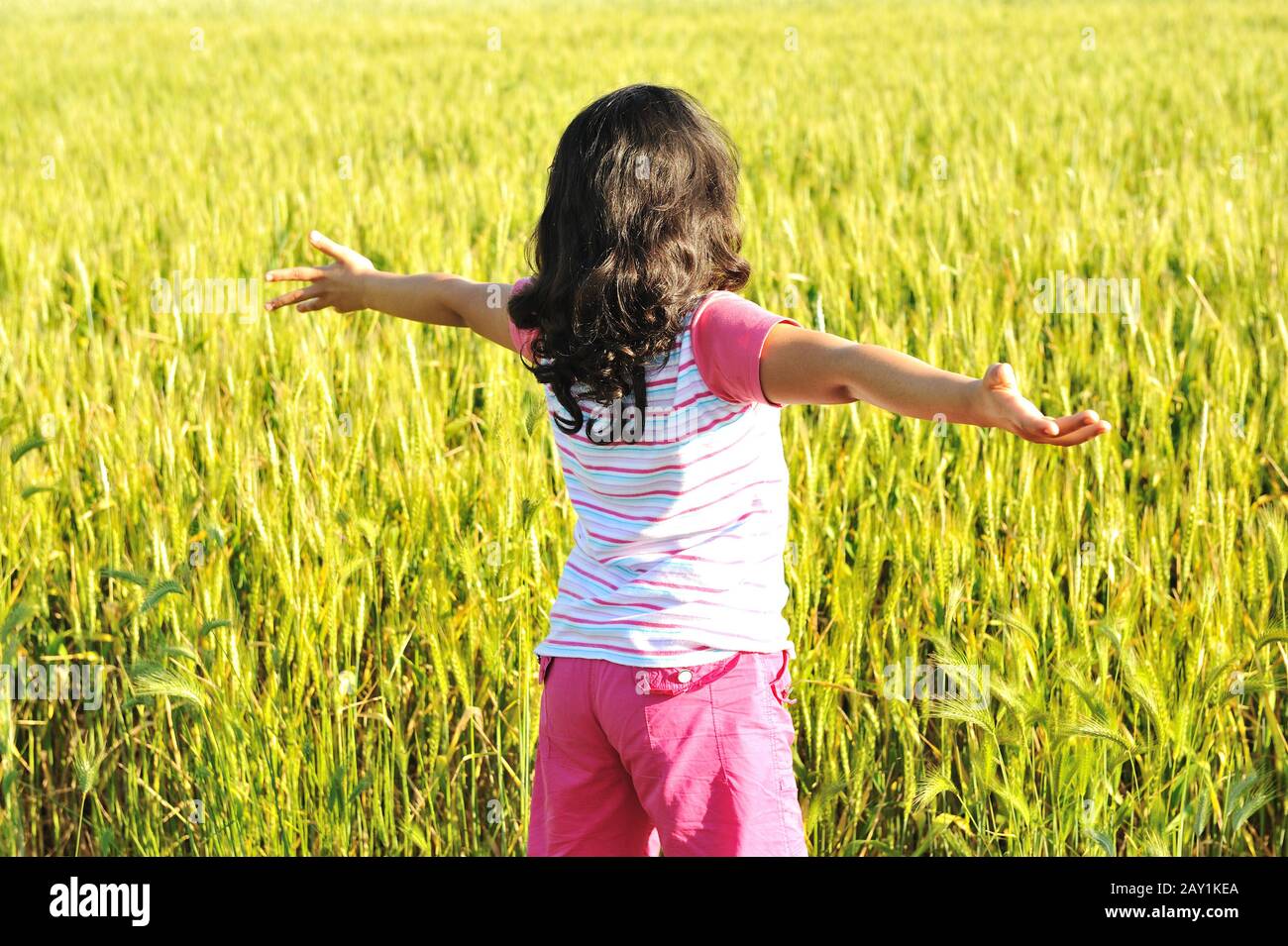 Freedom, girl in nature with opened arms Stock Photo - Alamy