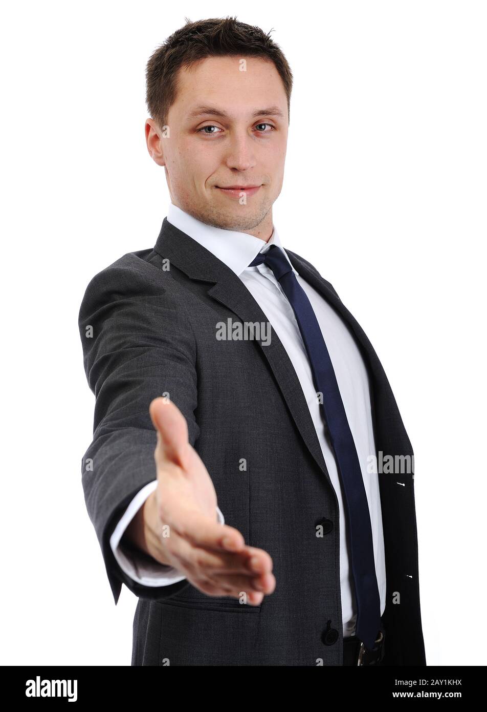 Business man extending hand to shake Stock Photo - Alamy