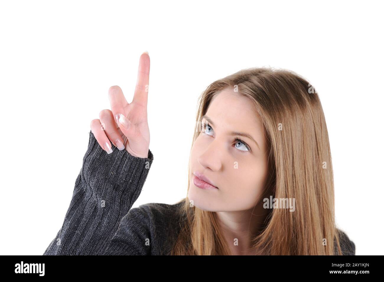 Teen girl with her finger up Stock Photo - Alamy