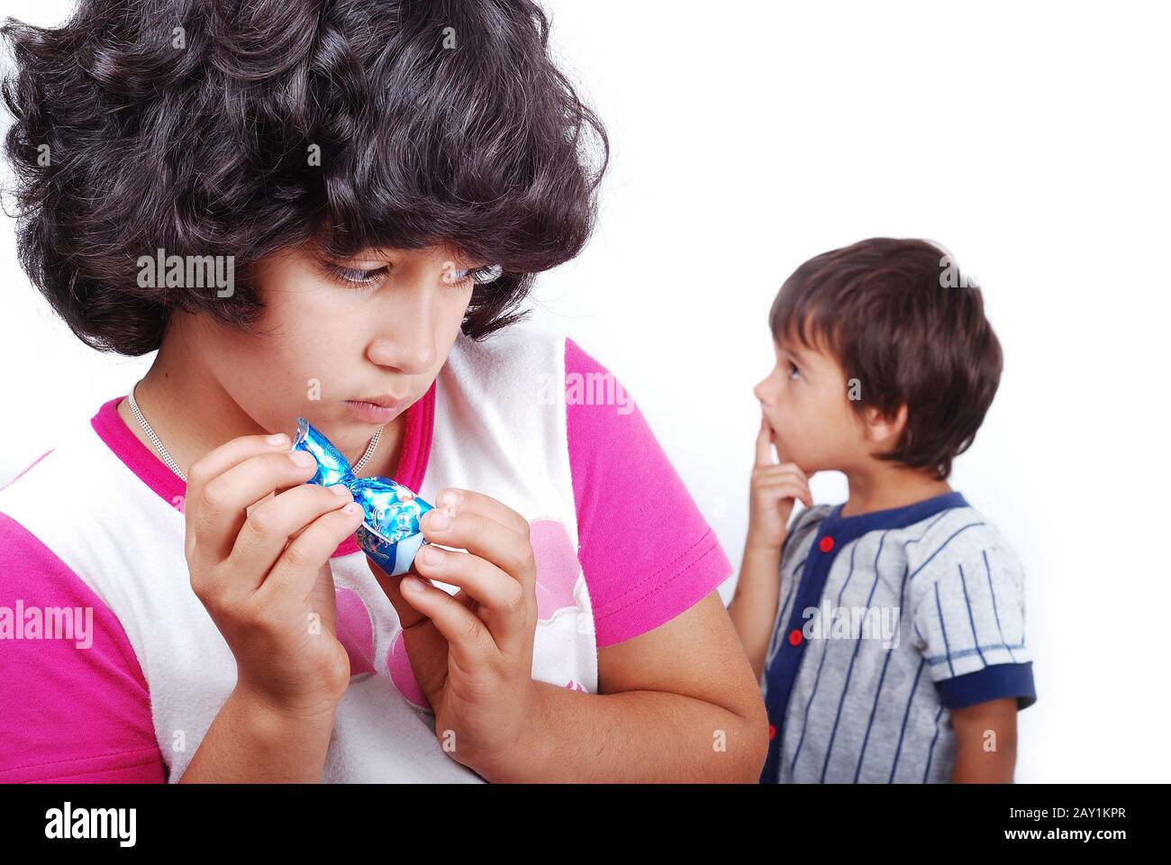 Hiding something hi-res stock photography and images - Alamy