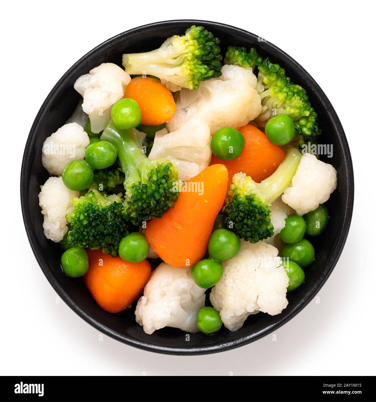 Mixed vegetables in black ceramic bowl isolated on white. Top view ...