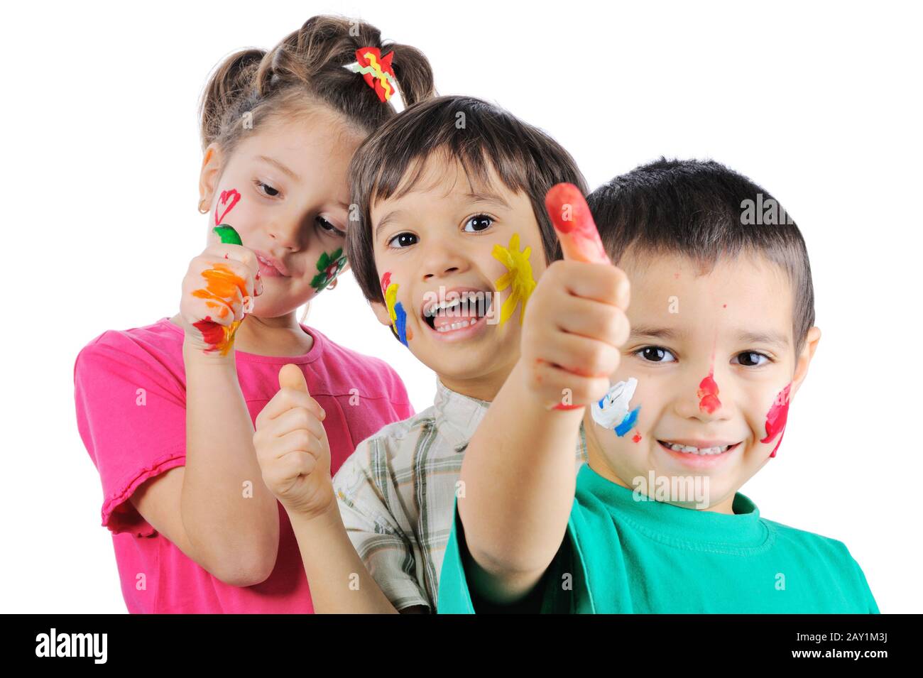 Messy children with paint on their hands and faces with thumbs up Stock ...