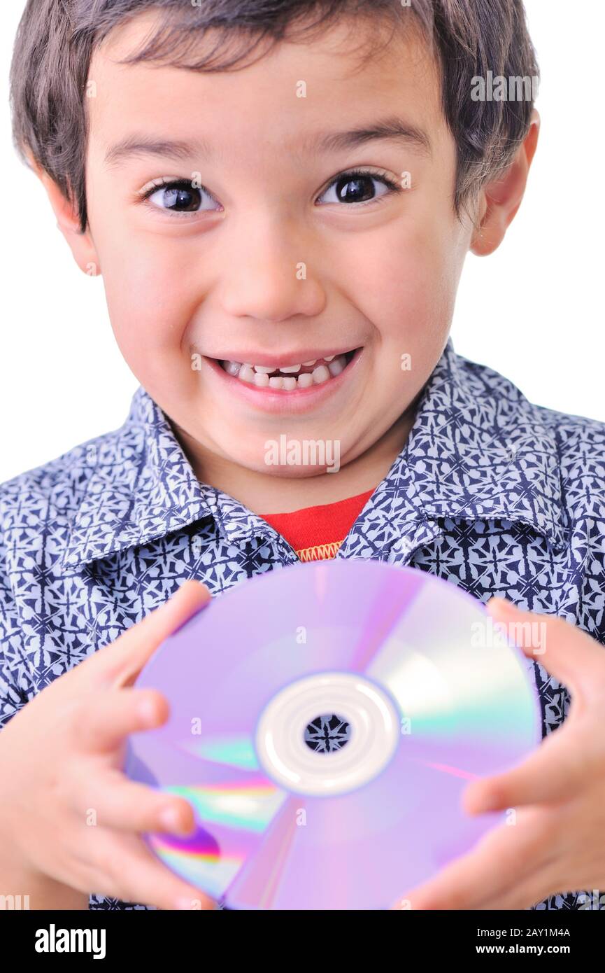 Little boy holding cd dvd Stock Photo - Alamy