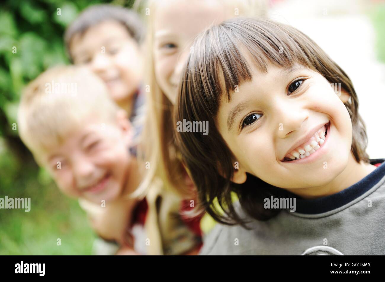 Happiness without limit, happy children together outdoor, faces ...