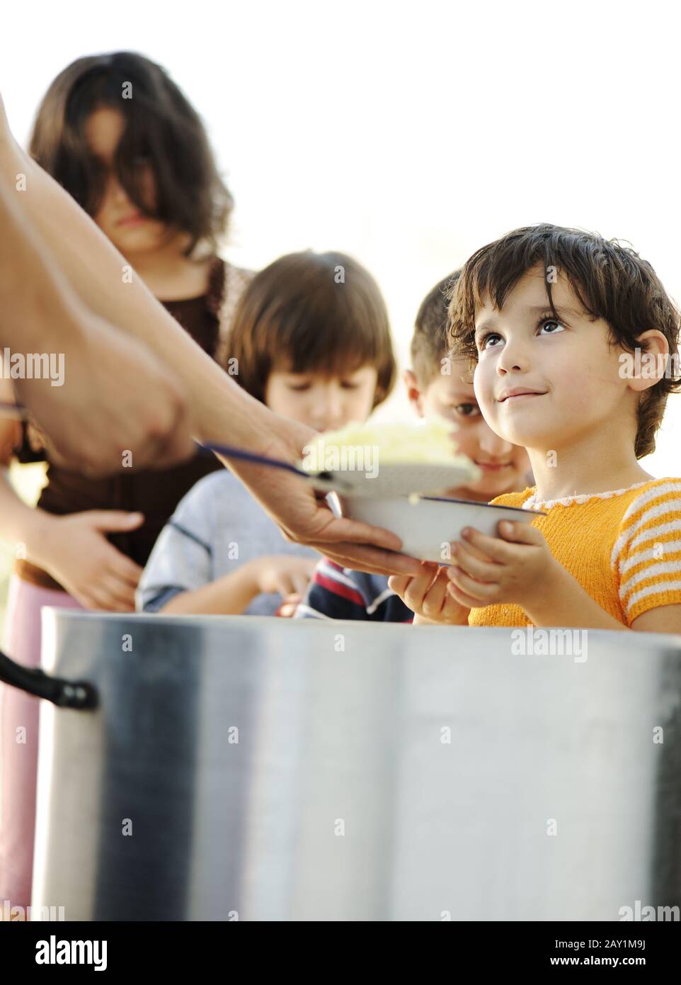 Hungry children hi-res stock photography and images - Alamy