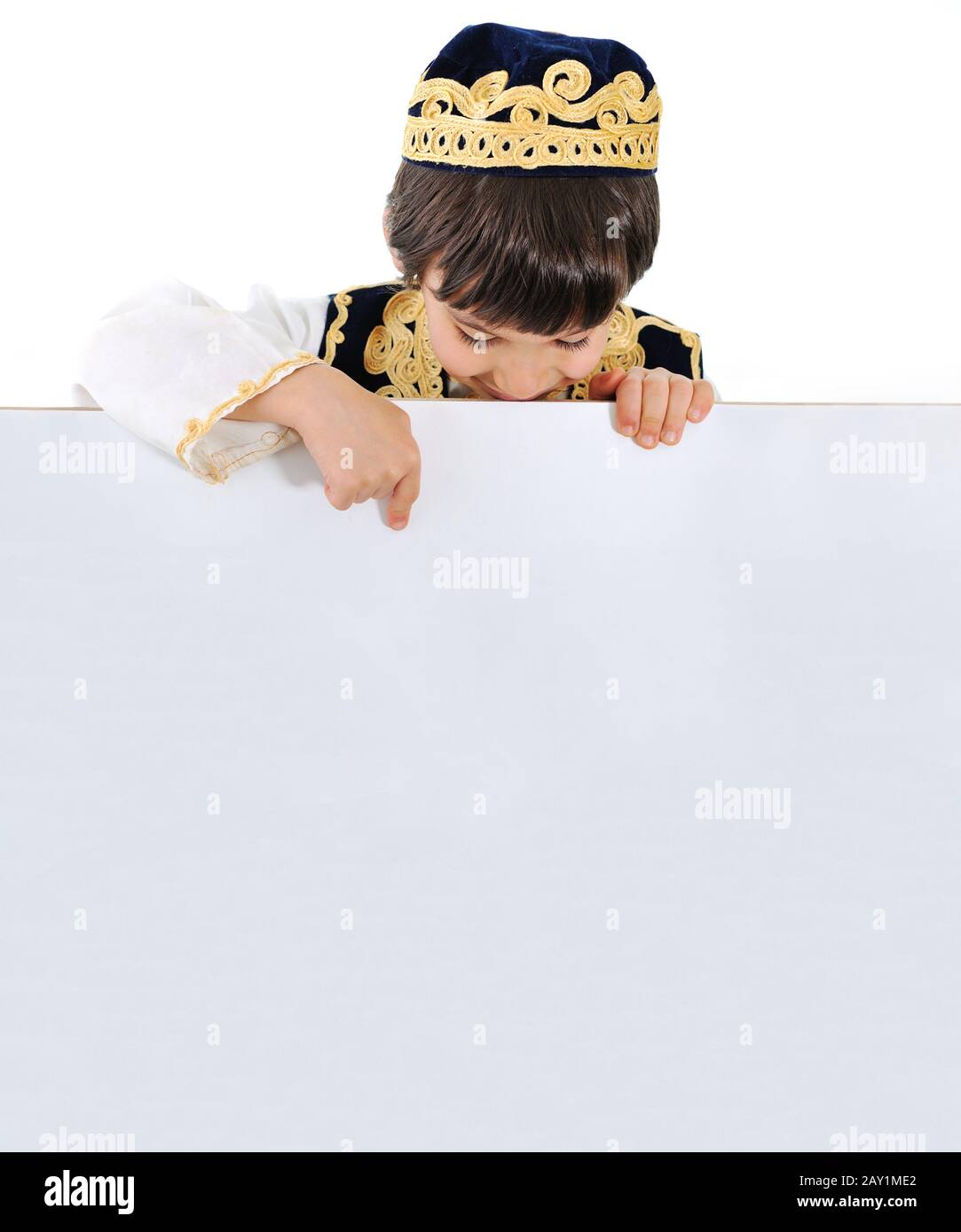 Kid wearing middle-eastern clothes with banner for your message Stock ...