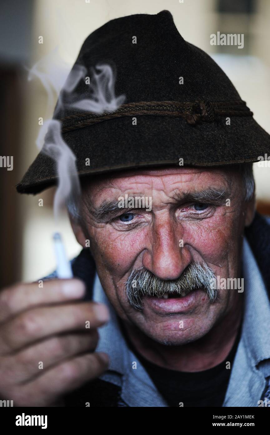 Closeup Artistic Photo of Aged Man With Grey Mustache Smoking Cigarette ...