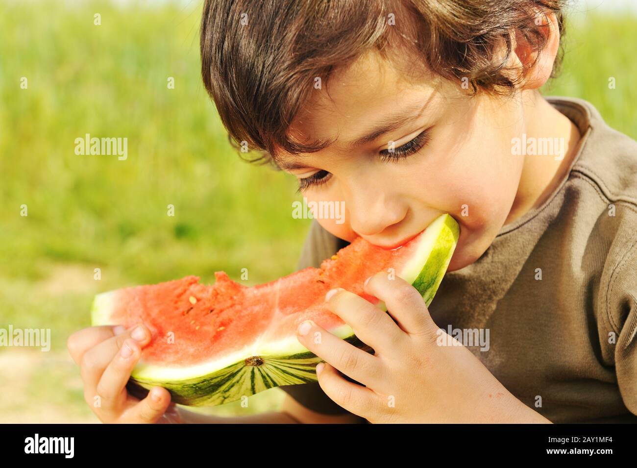 Eating watermelon outside Stock Photo - Alamy