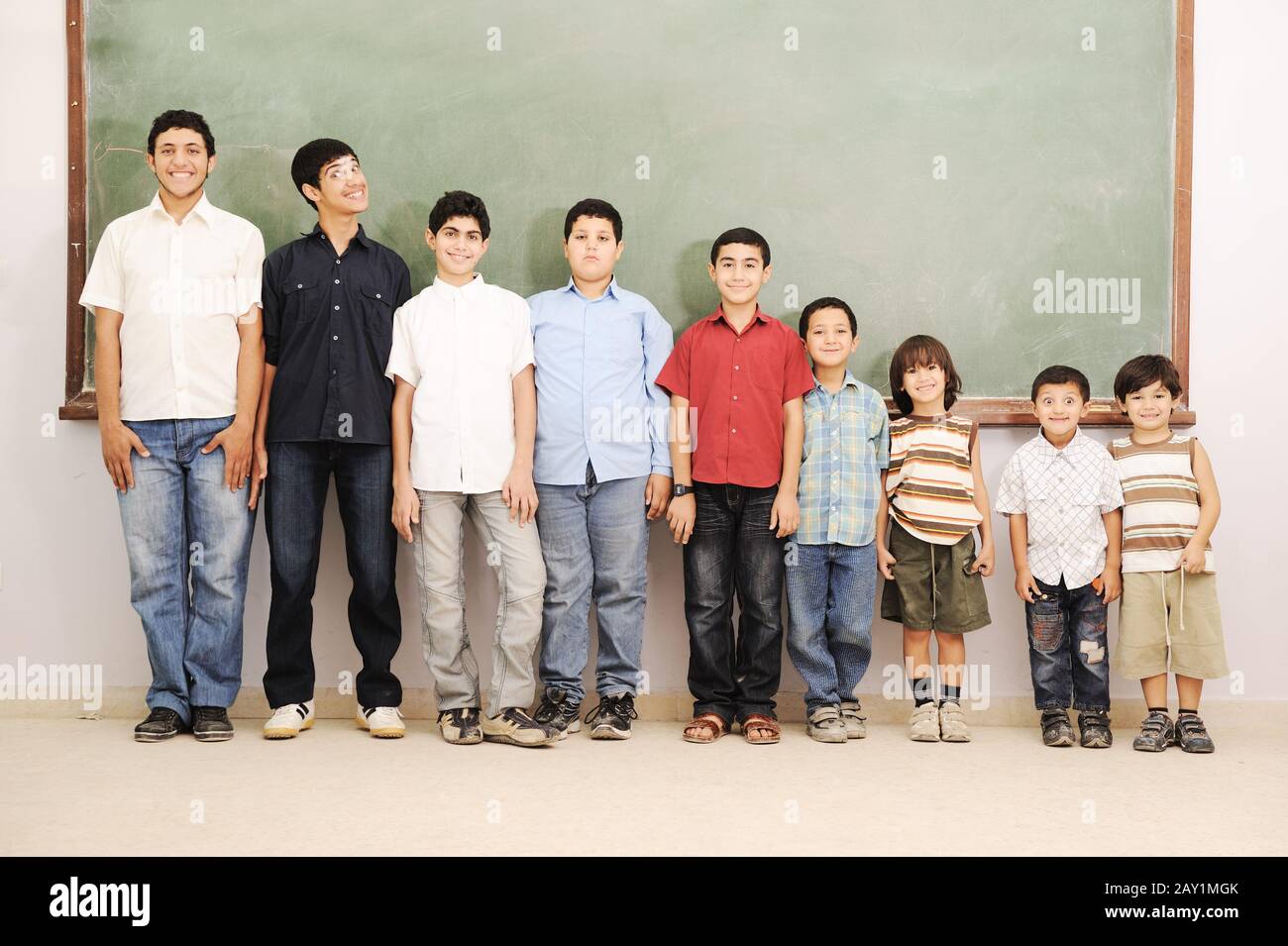 From preschool to college boys, aging concept Stock Photo - Alamy