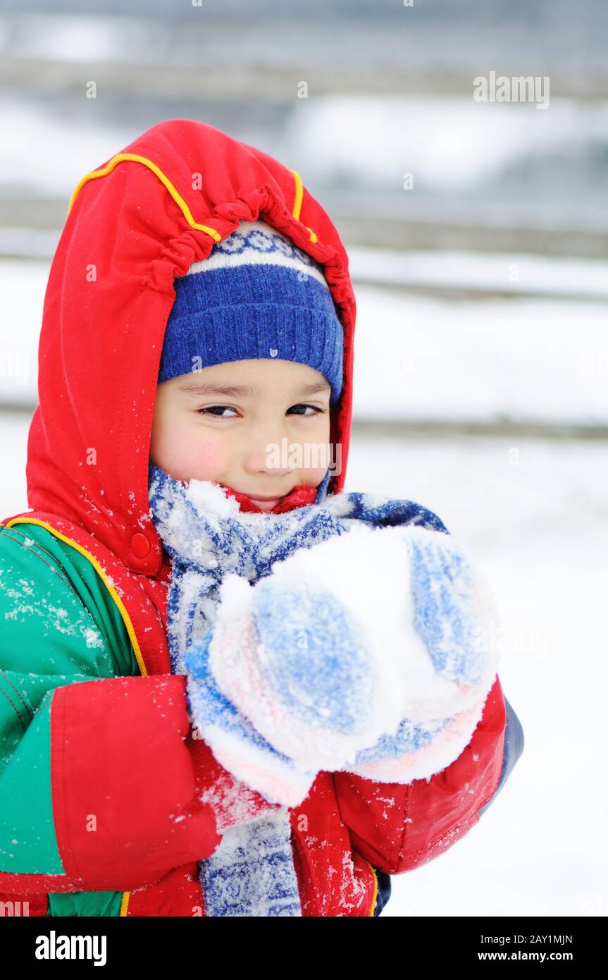 Child in snow Stock Photo - Alamy