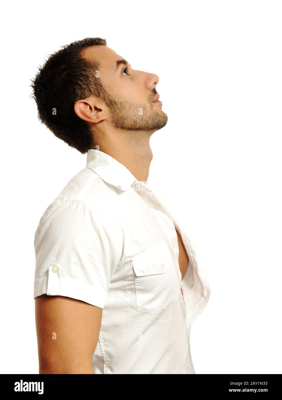 Thoughtful casual man looking up - isolated over a white background ...
