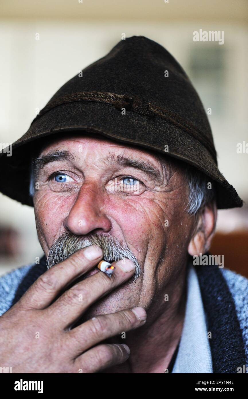 Closeup Artistic Photo of Aged Man With Grey Mustache Smoking Cigarette ...