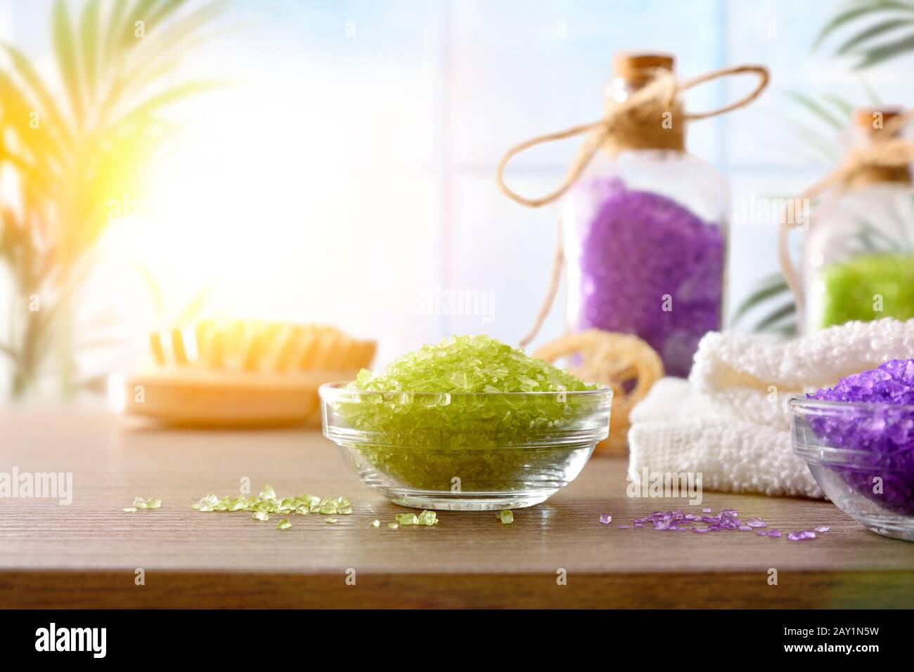 Skin care products on white table and window background Stock Photo - Alamy
