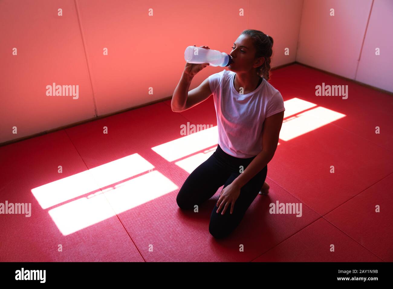 Judoka drinking water in the gym Stock Photo - Alamy