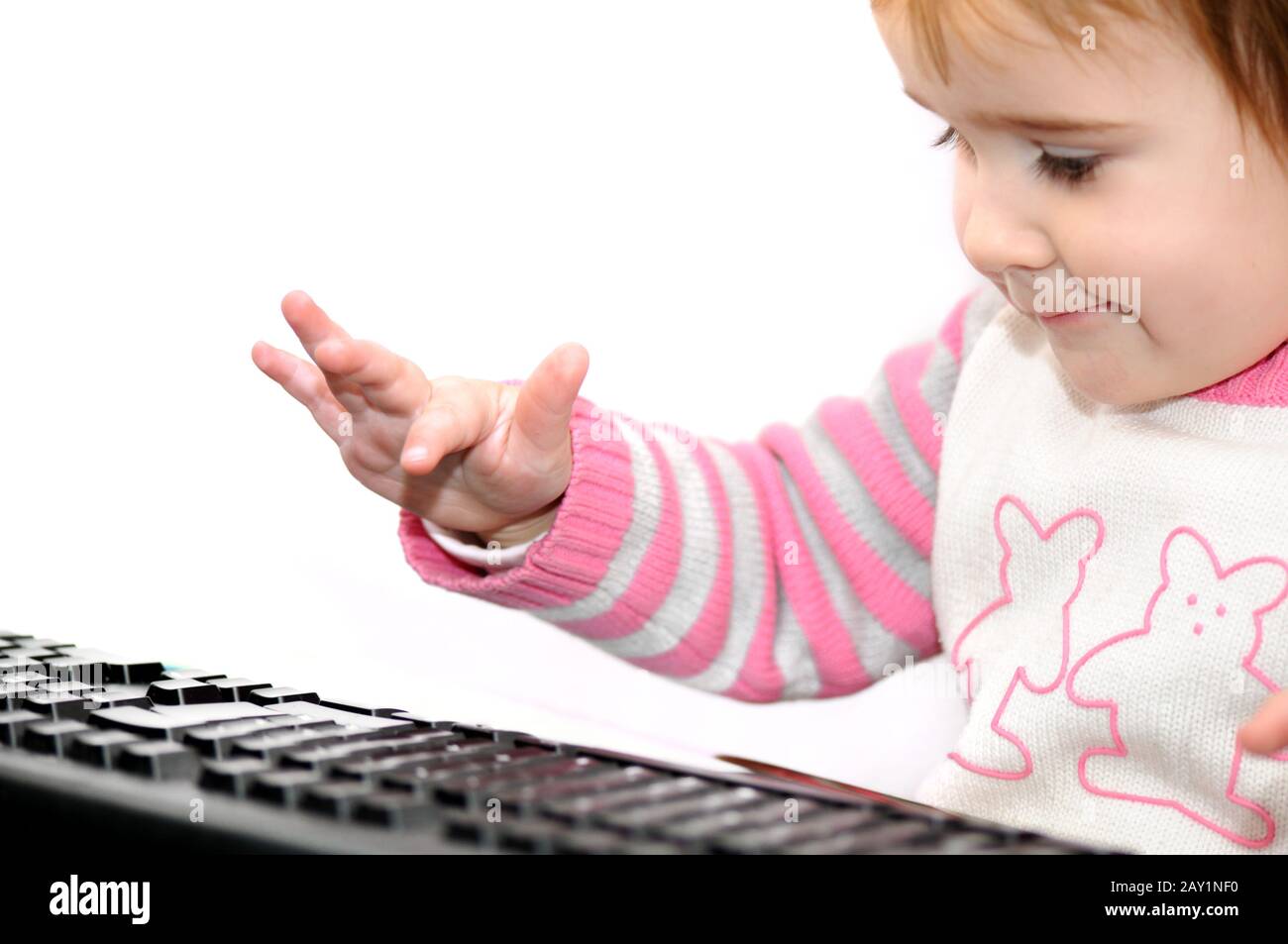 Baby on keyboard Stock Photo - Alamy