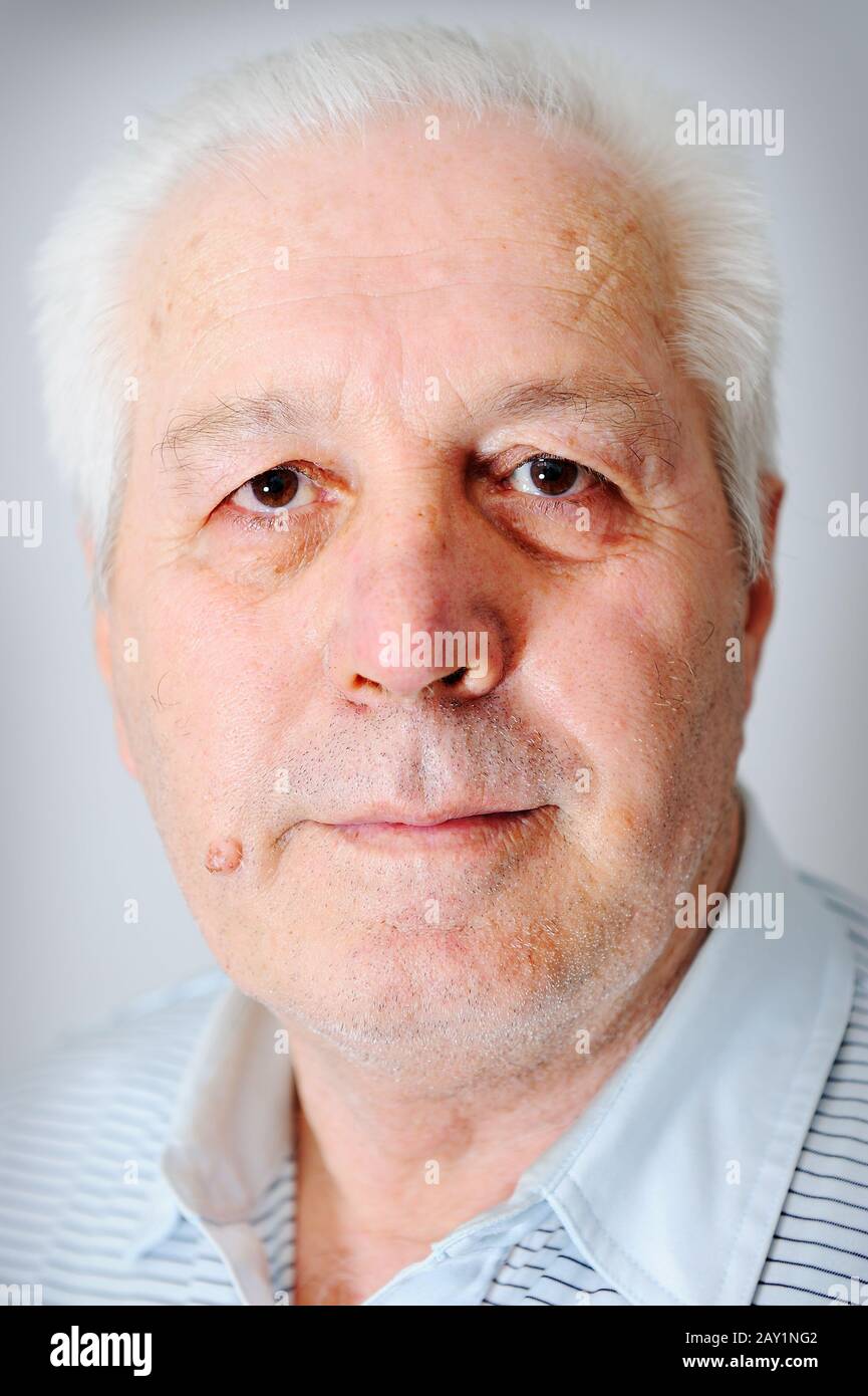 A portrait of a smiling old man Stock Photo - Alamy