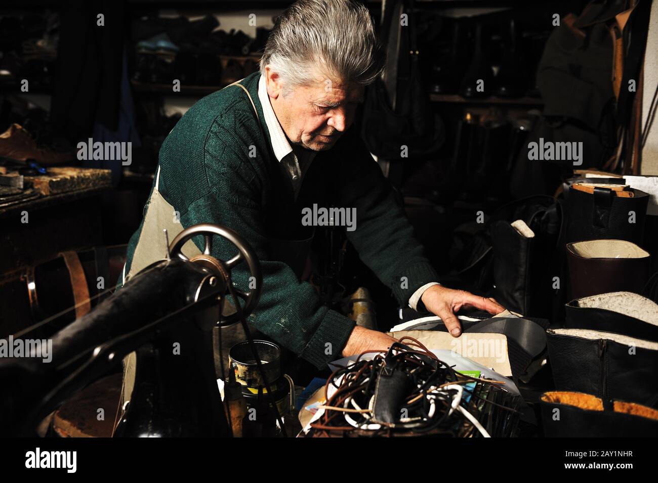 Old fashioned shoe repair hi-res stock photography and images - Alamy