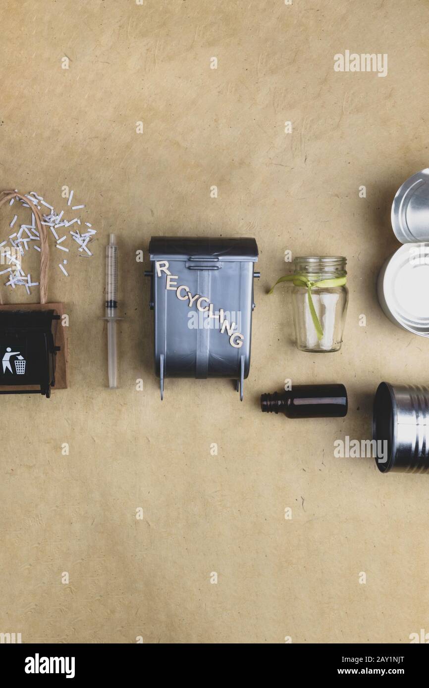 top view of trash bins and assorted garbage as paper, plastic, glass ...