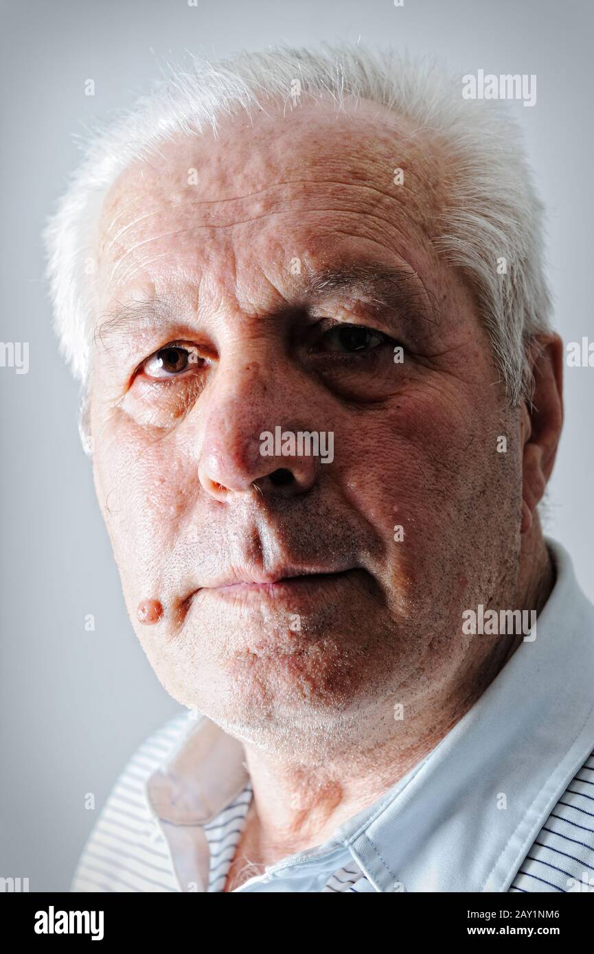 A portrait of a smiling old man Stock Photo - Alamy