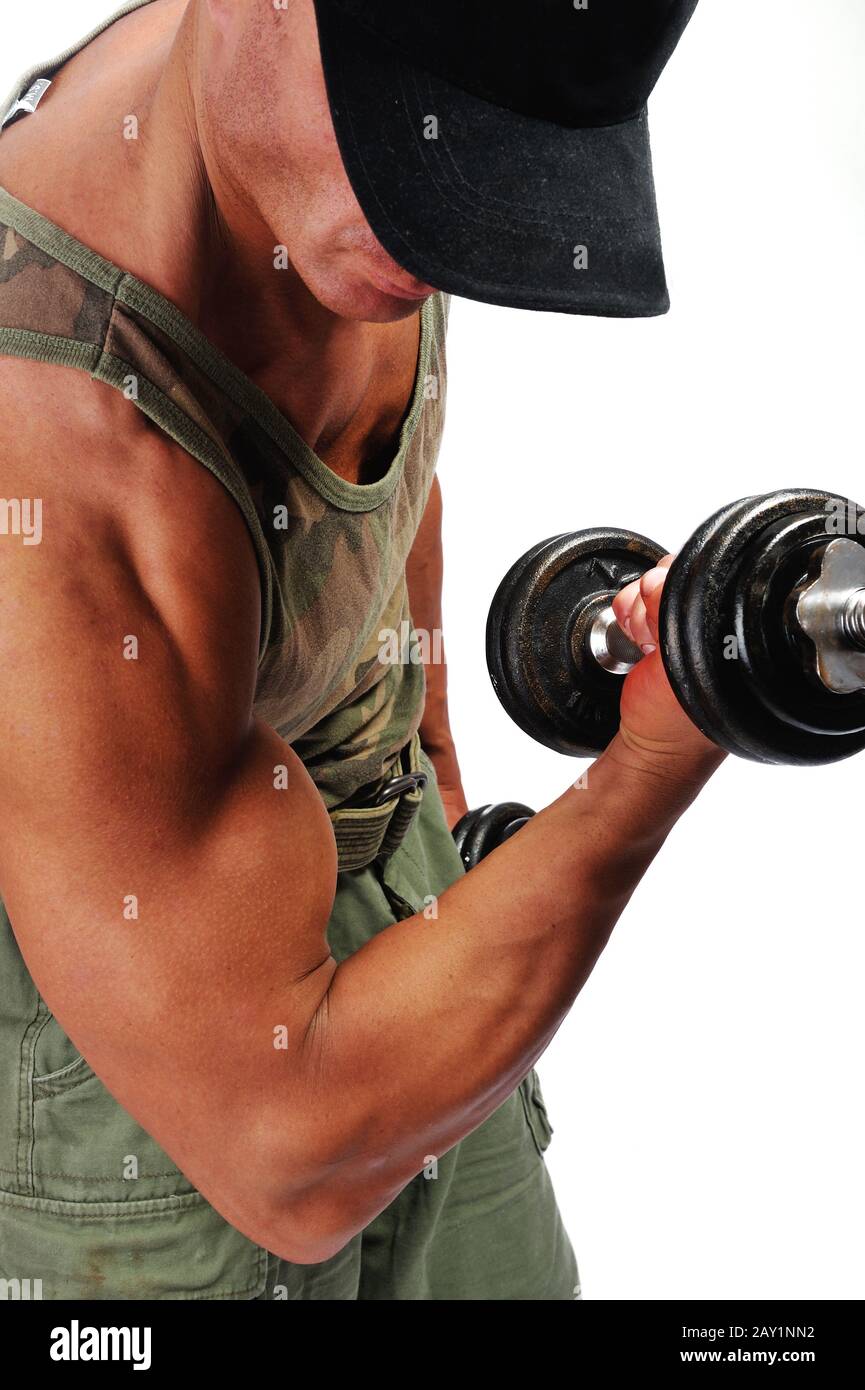 Man lifting weights Stock Photo - Alamy