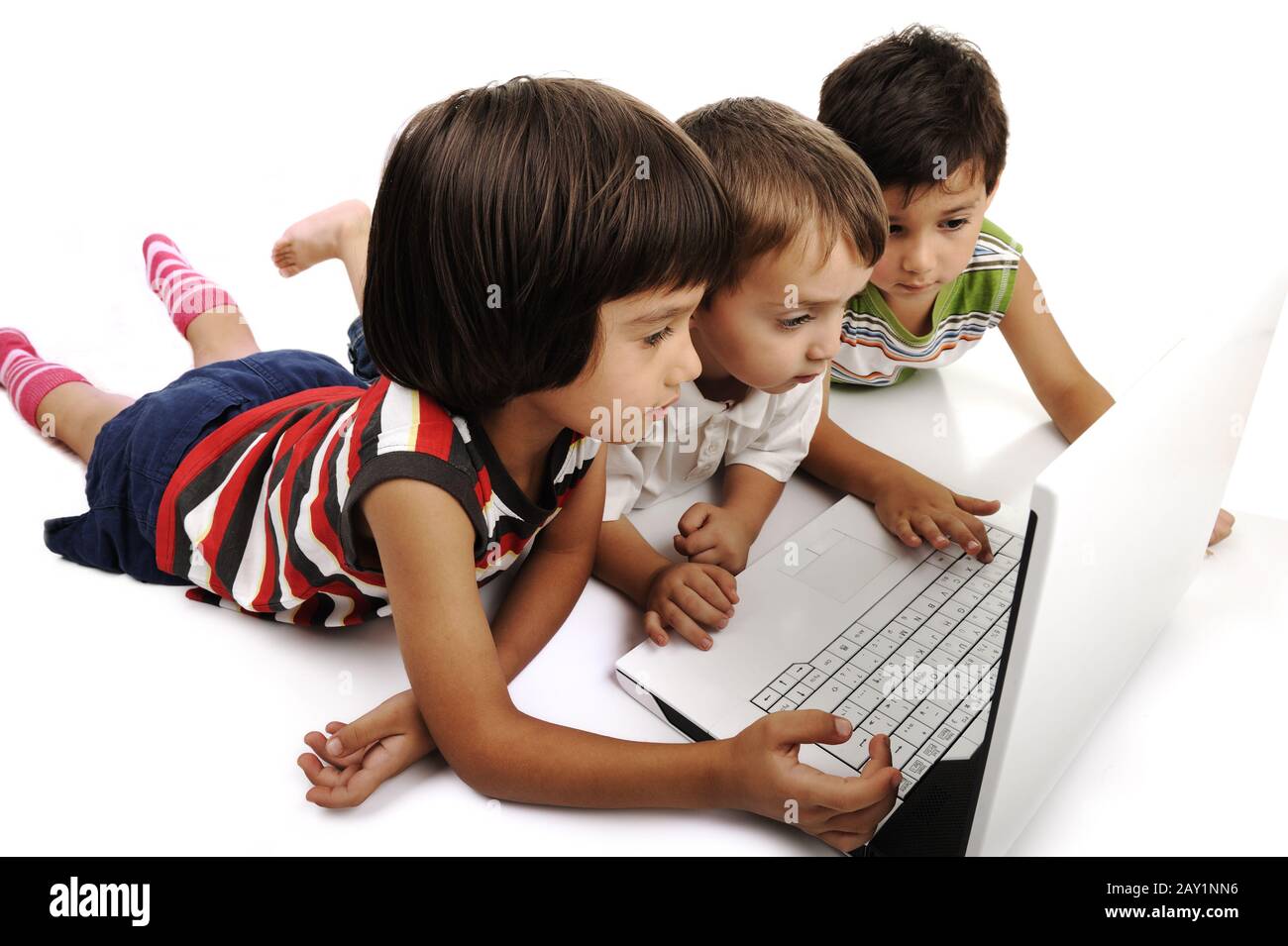 Child group computer study Cut Out Stock Images & Pictures - Alamy
